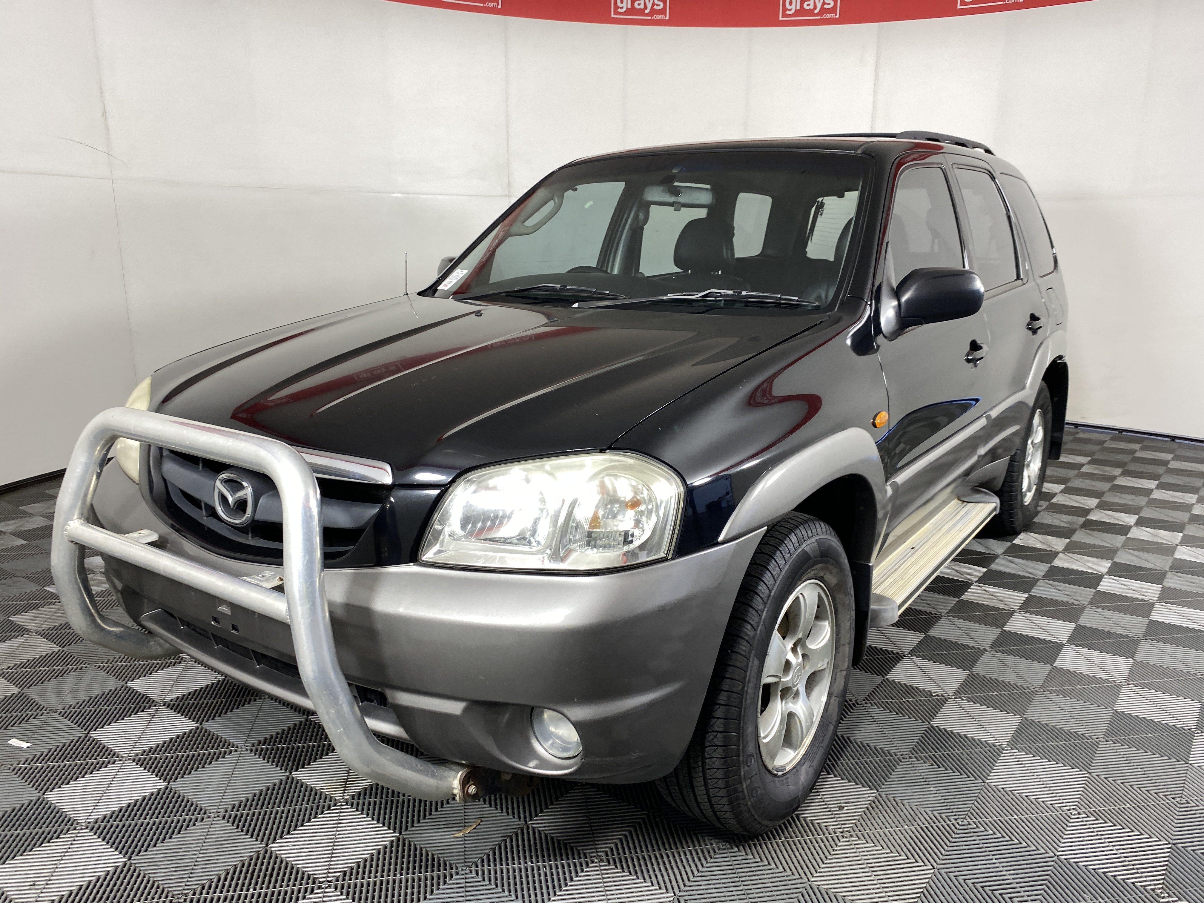 Mazda tribute nudge bar store