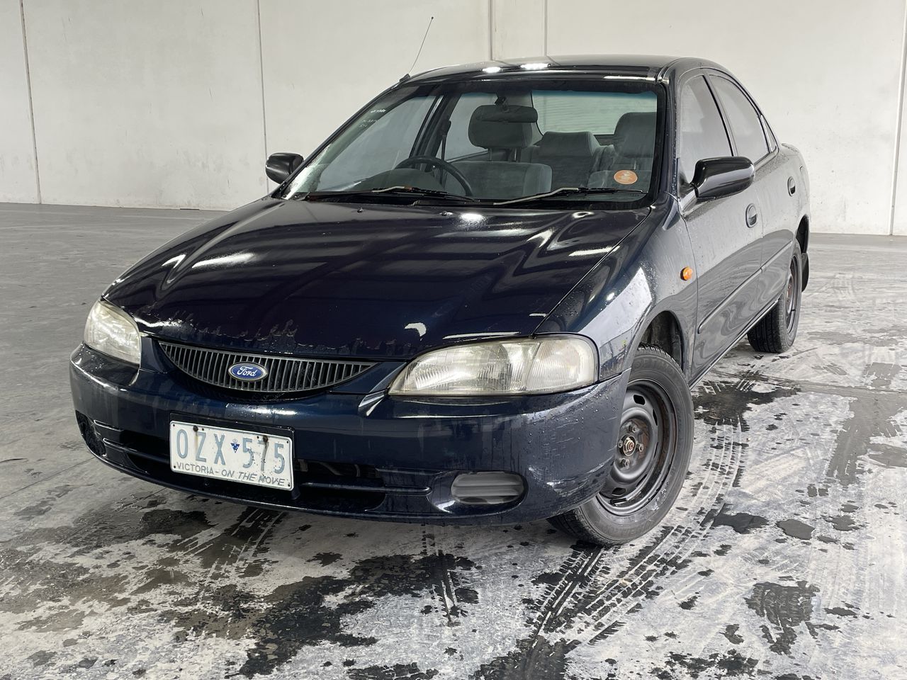 1998 Ford Laser GLXI KJIII Manual Sedan Auction (0001-20065140) | Grays Australia