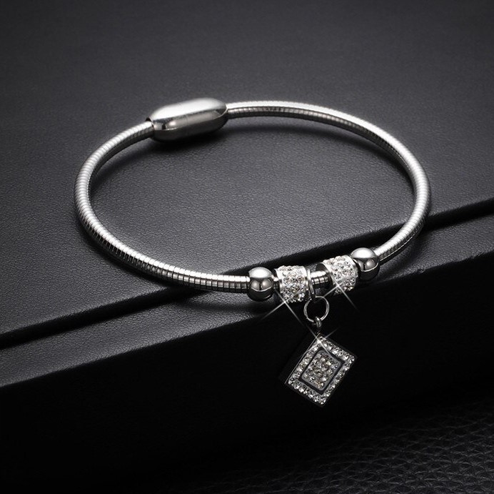 Classy Snake Bangle Featuring a Simulated Diamond Square Charm Auction ...
