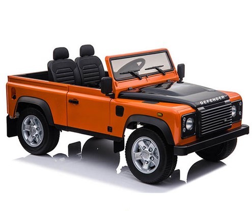 LAND ROVER Defender 12V Ride On, Orange. NB: Has been used, not in ...