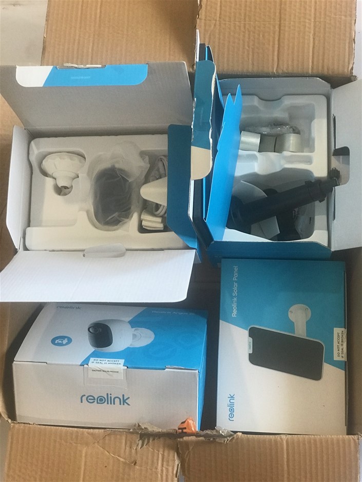 Box of security cameras solar panel and wi-fi camera accessories ...
