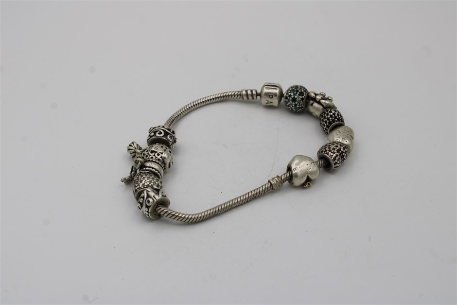 A Stamped 925 Sterling Silver Pandora Bracelet Auction (0028-9047909 ...